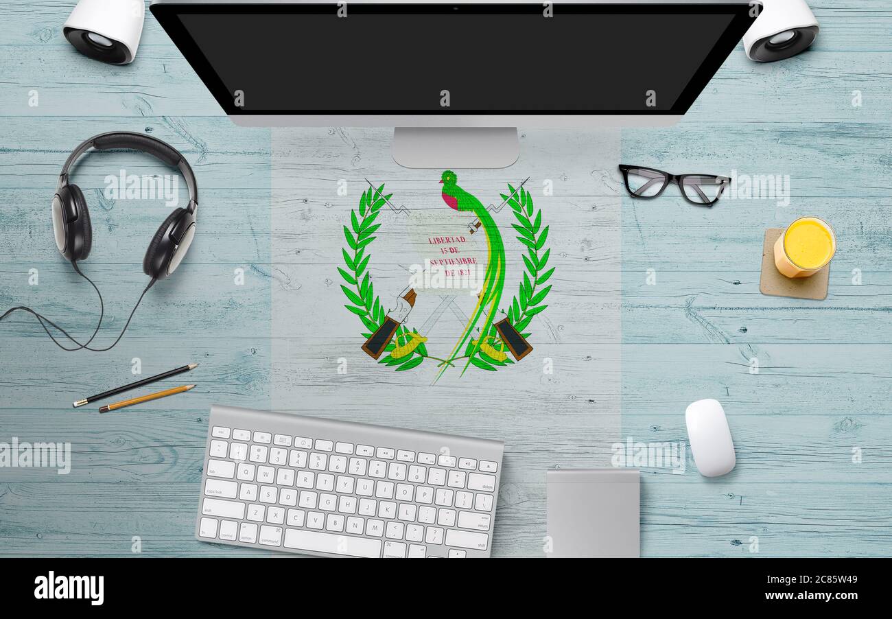 Guatemala flag background with headphone,computer keyboard and mouse on ...