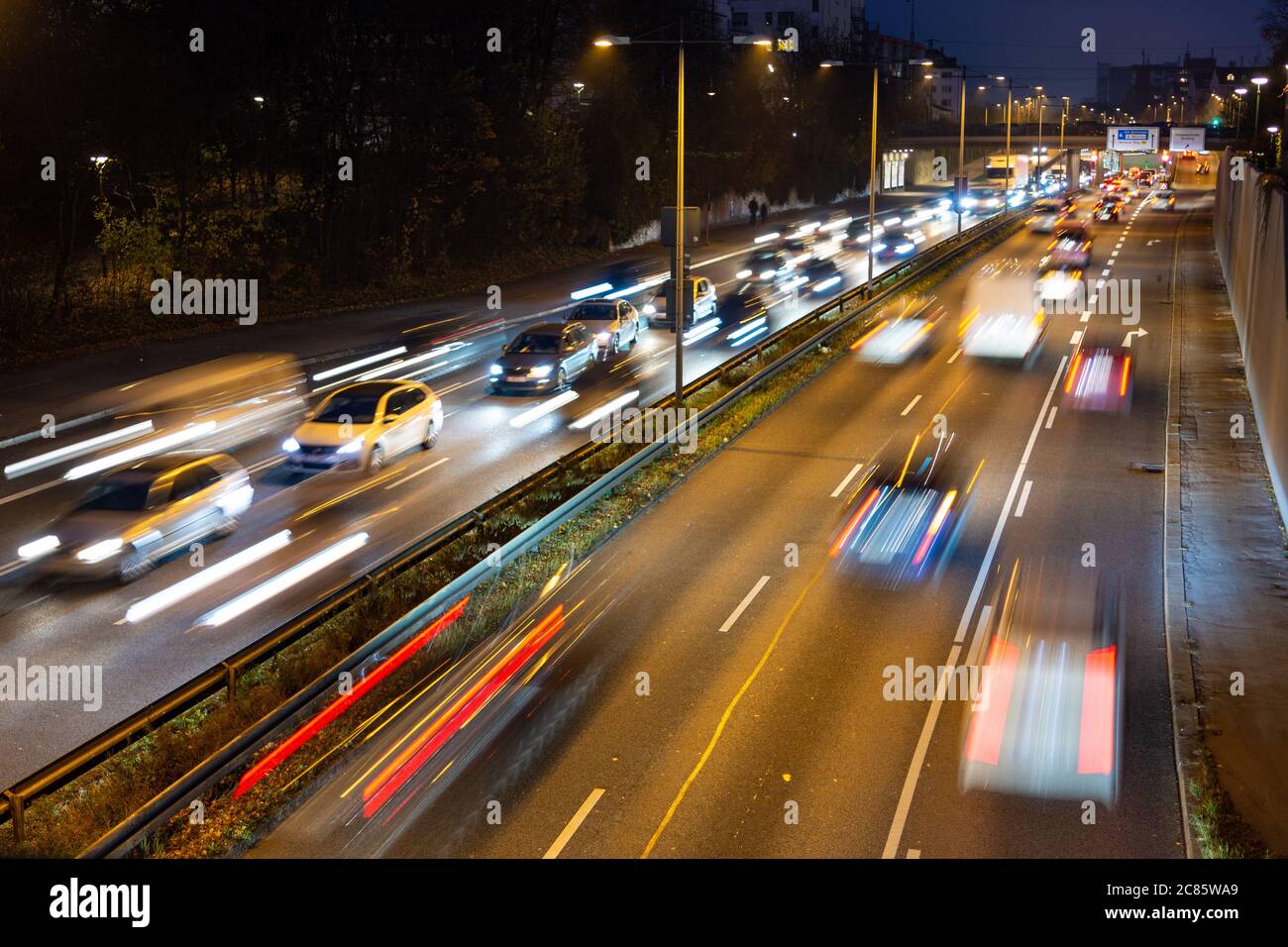 Light trails from cars at junction hi-res stock photography and images ...
