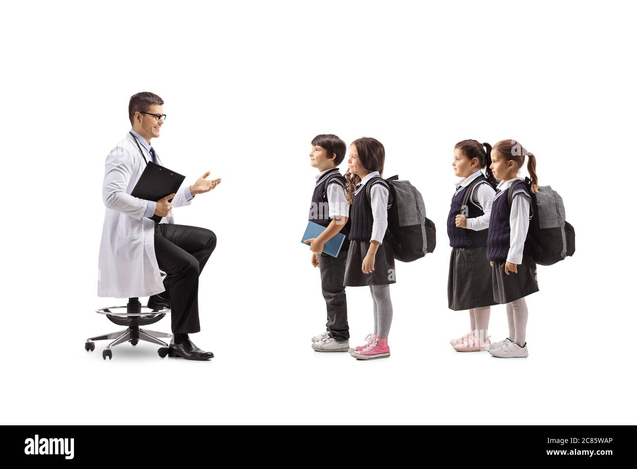 Male pediatrician doctor sitting and talking to a group of ...