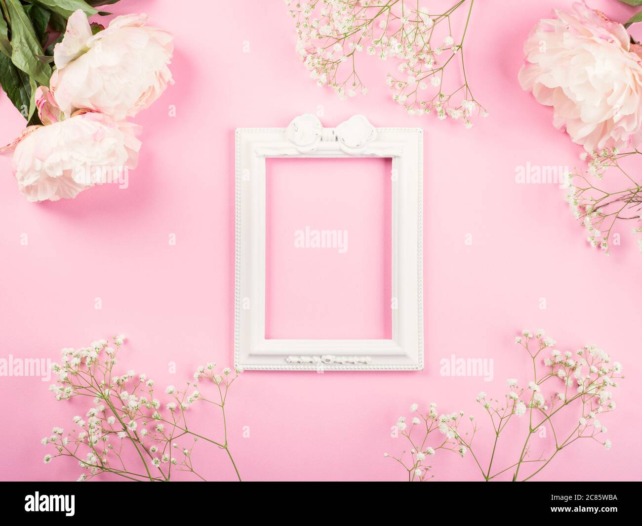 Pink pastel frame background with peonies Stock Photo - Alamy