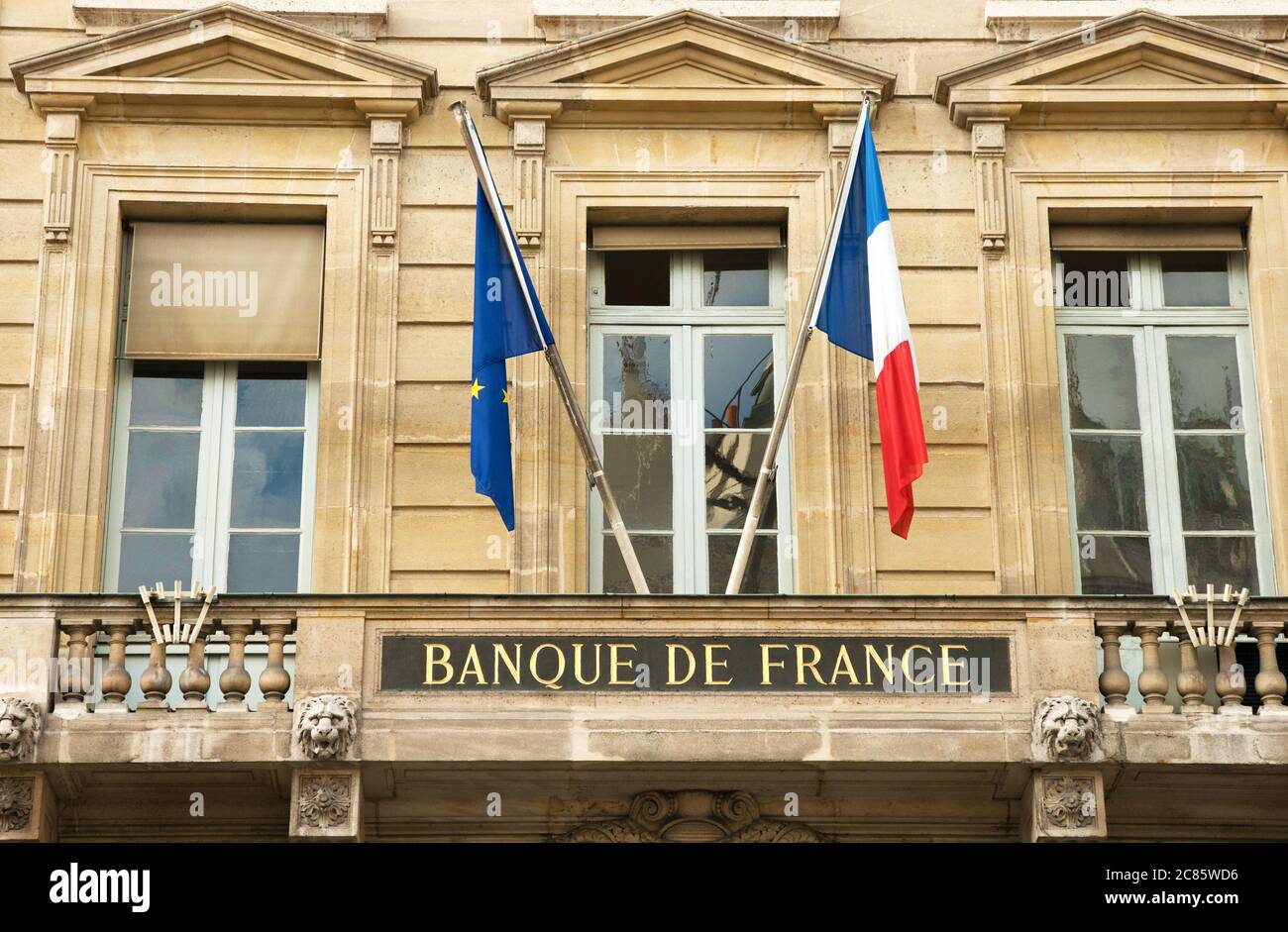 Three windows of a building, headquarters of Bank of France. No people ...