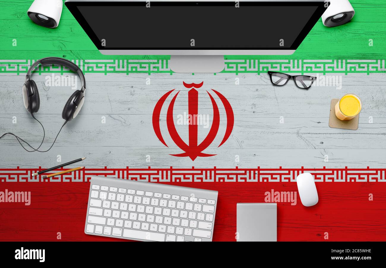 Iran flag background with headphone,computer keyboard and mouse on ...