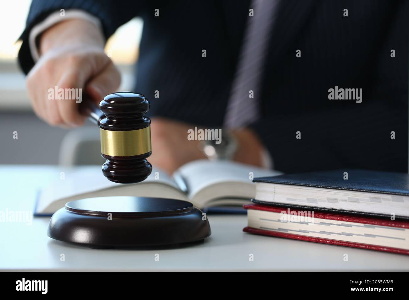 Close up of judge that knocking on wooden support Stock Photo - Alamy