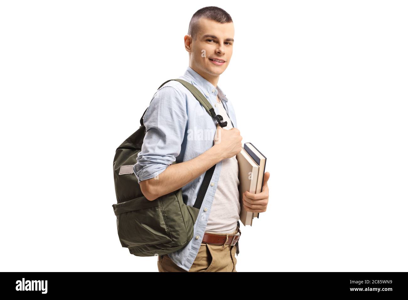 Male college student carrying books isolated on white background Stock ...