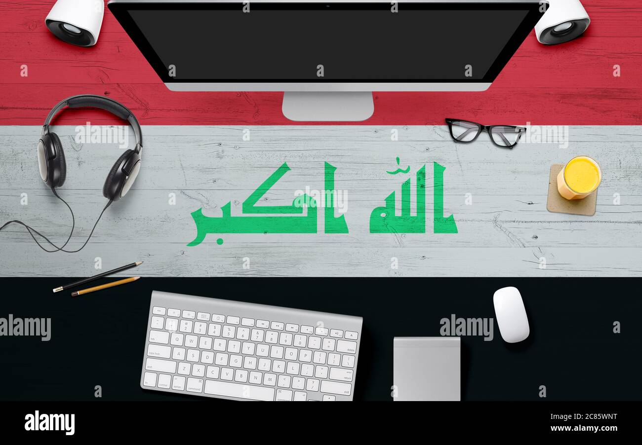 Iraq flag background with headphone,computer keyboard and mouse on ...