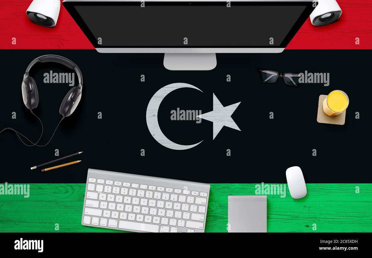 Libya flag background with headphone,computer keyboard and mouse on ...