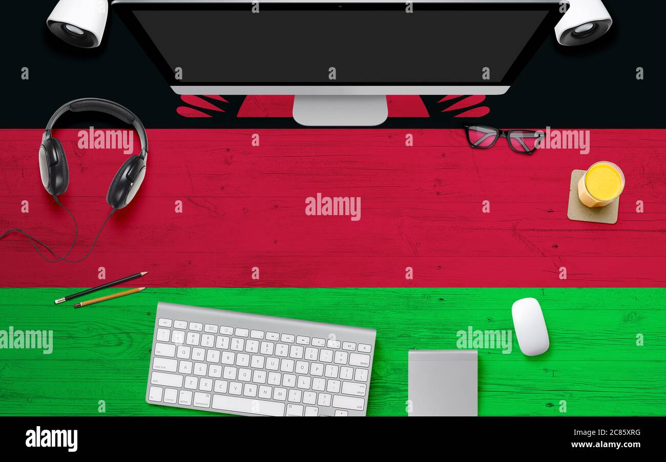 Malawi flag background with headphone,computer keyboard and mouse on ...