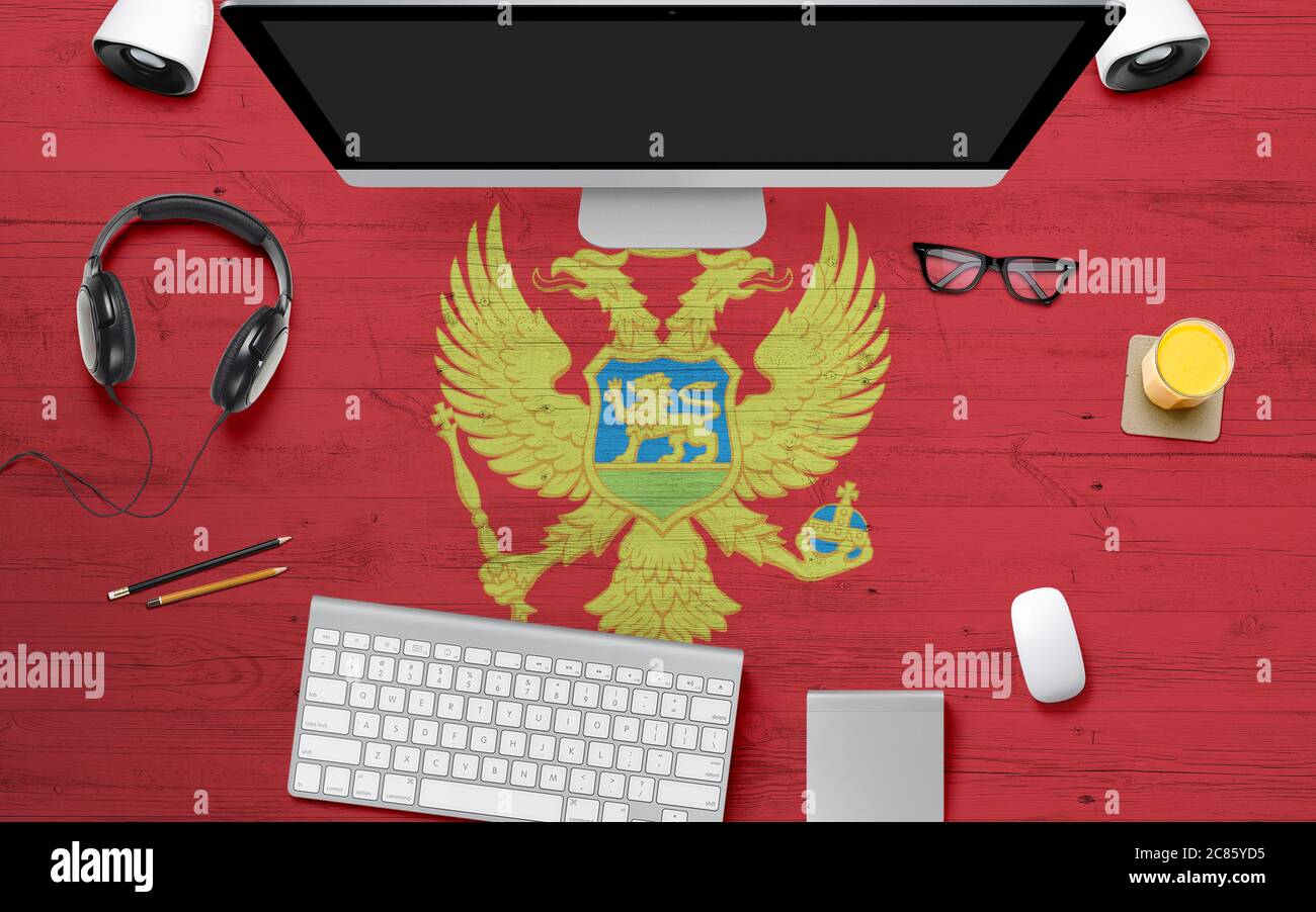 Montenegro flag background with headphone,computer keyboard and mouse ...