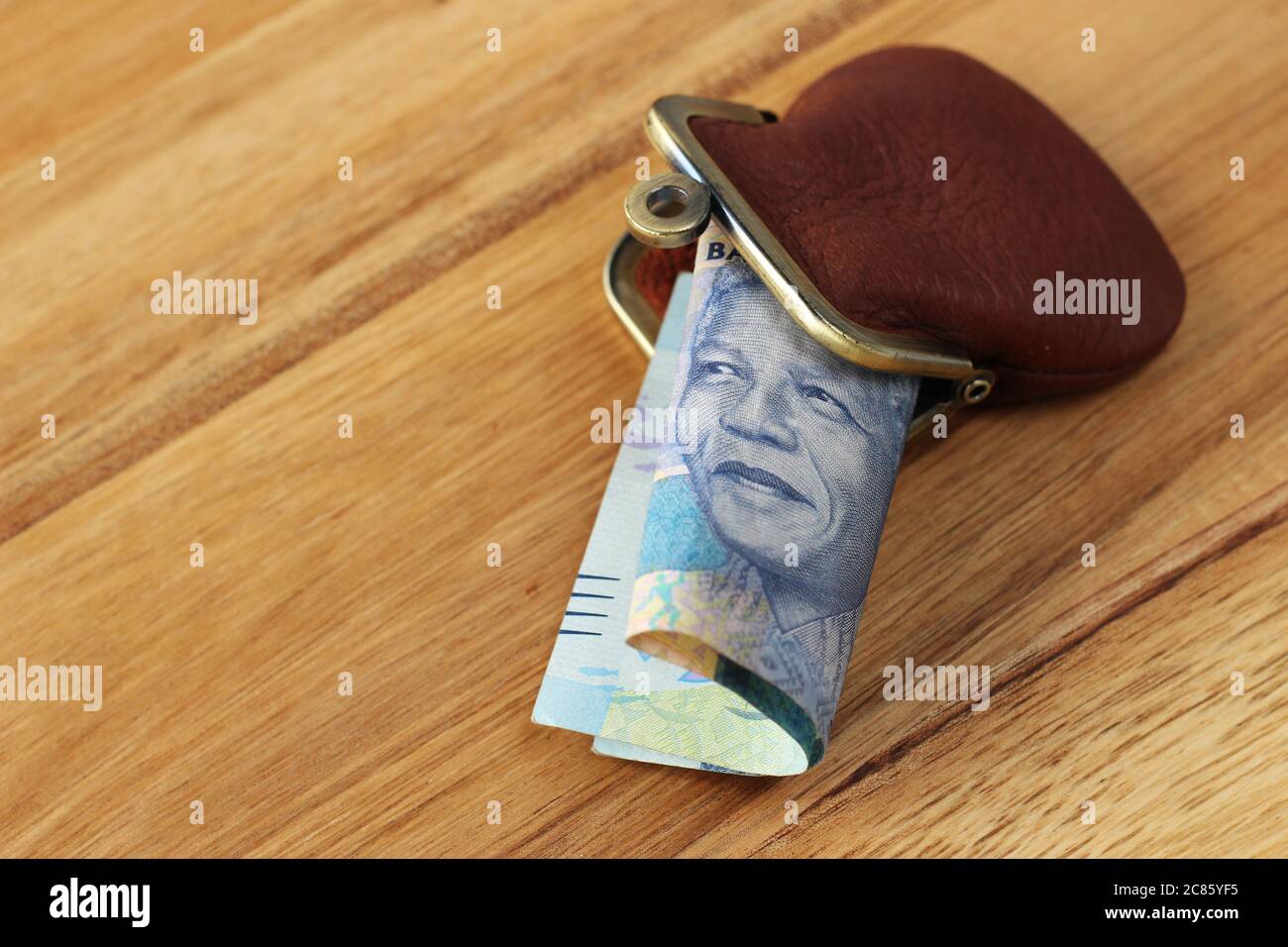 Close up shot of South African rand banknote not fitting into a small ...