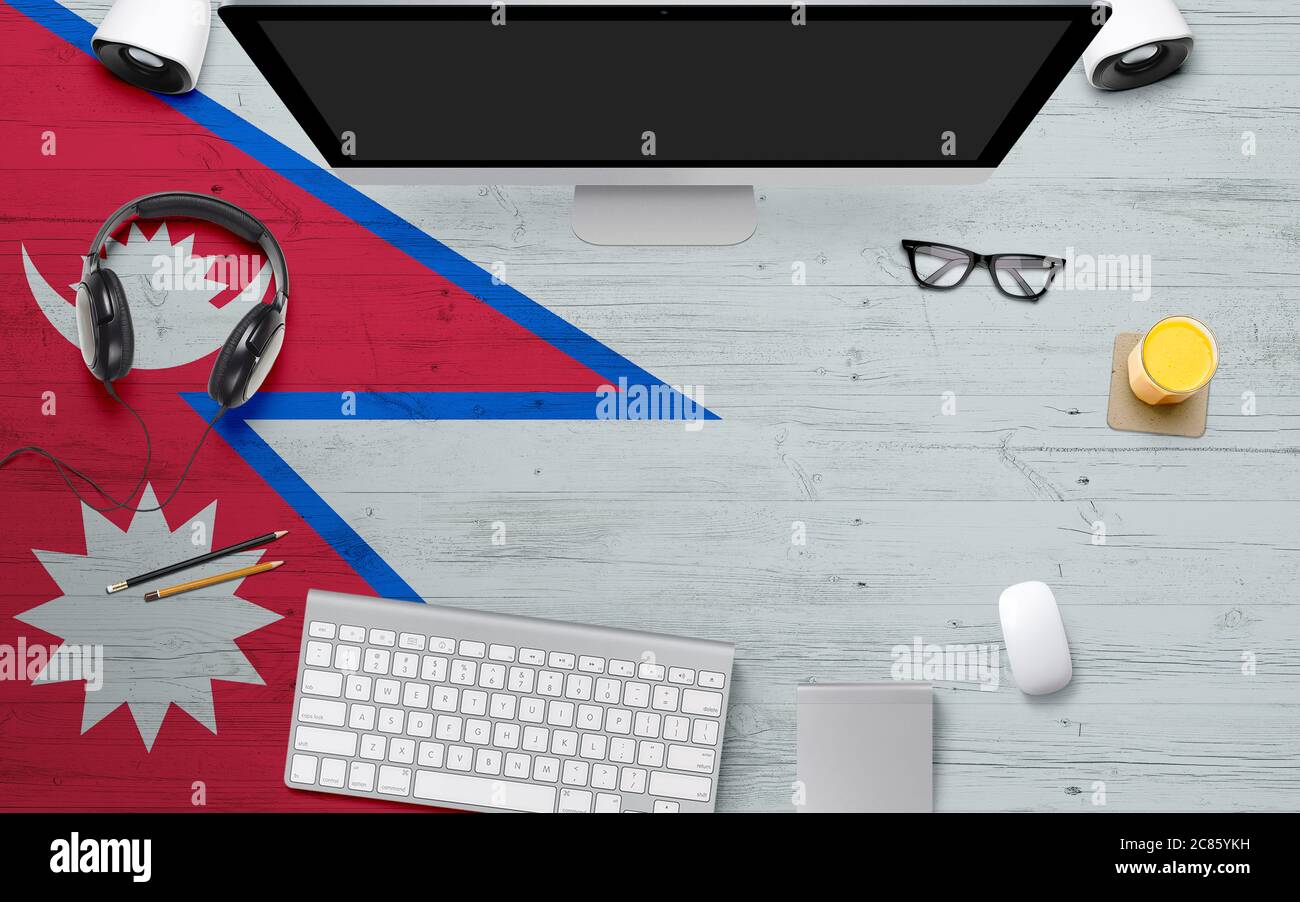 Nepal flag background with headphone,computer keyboard and mouse on ...