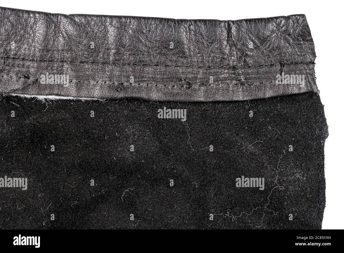 Piece of messy black leather isolated on white background. Crumpled ...