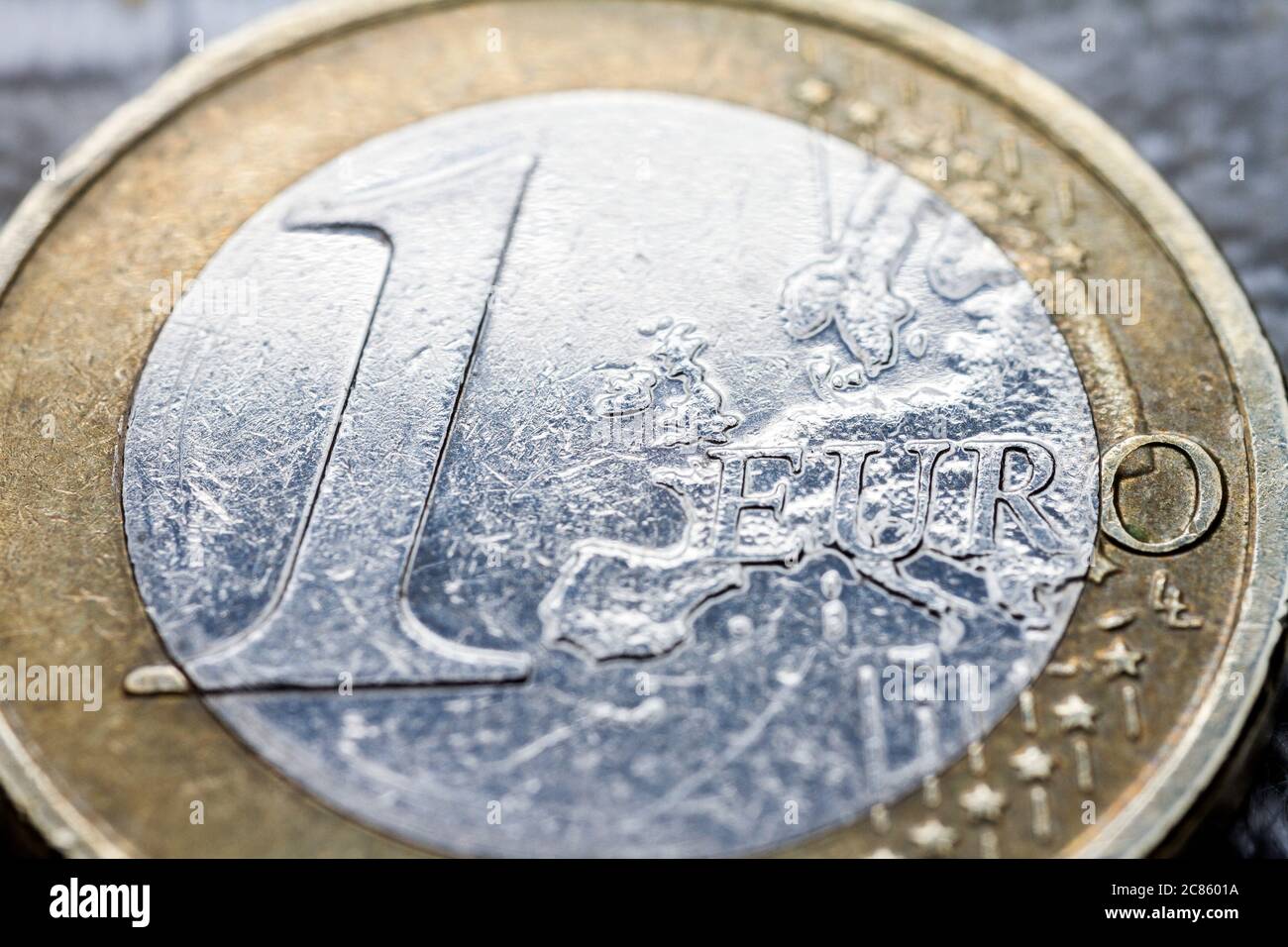 One euro coin macro detail with euro word. 1 euro coin macro view ...
