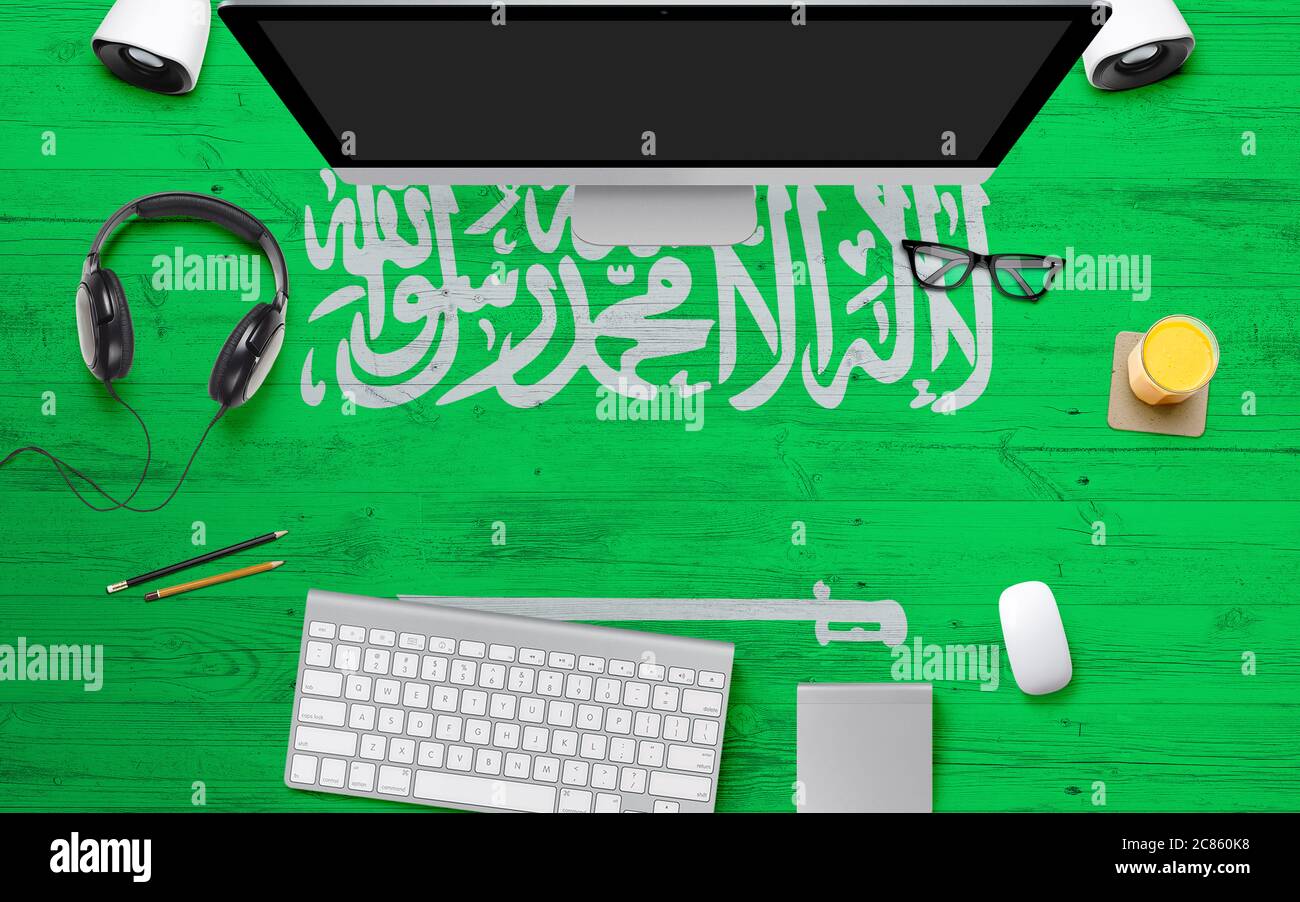 Saudi Arabia flag background with headphone,computer keyboard and mouse ...