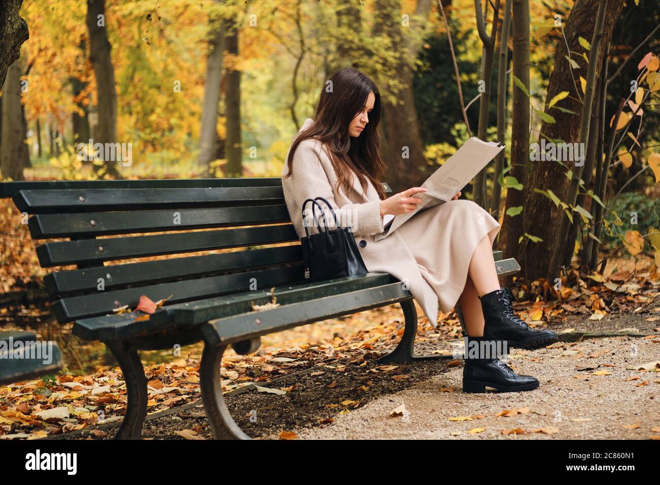 Girl Sitting Down On Bench 65,517 Woman Sitting On Bench Stock Photos,
