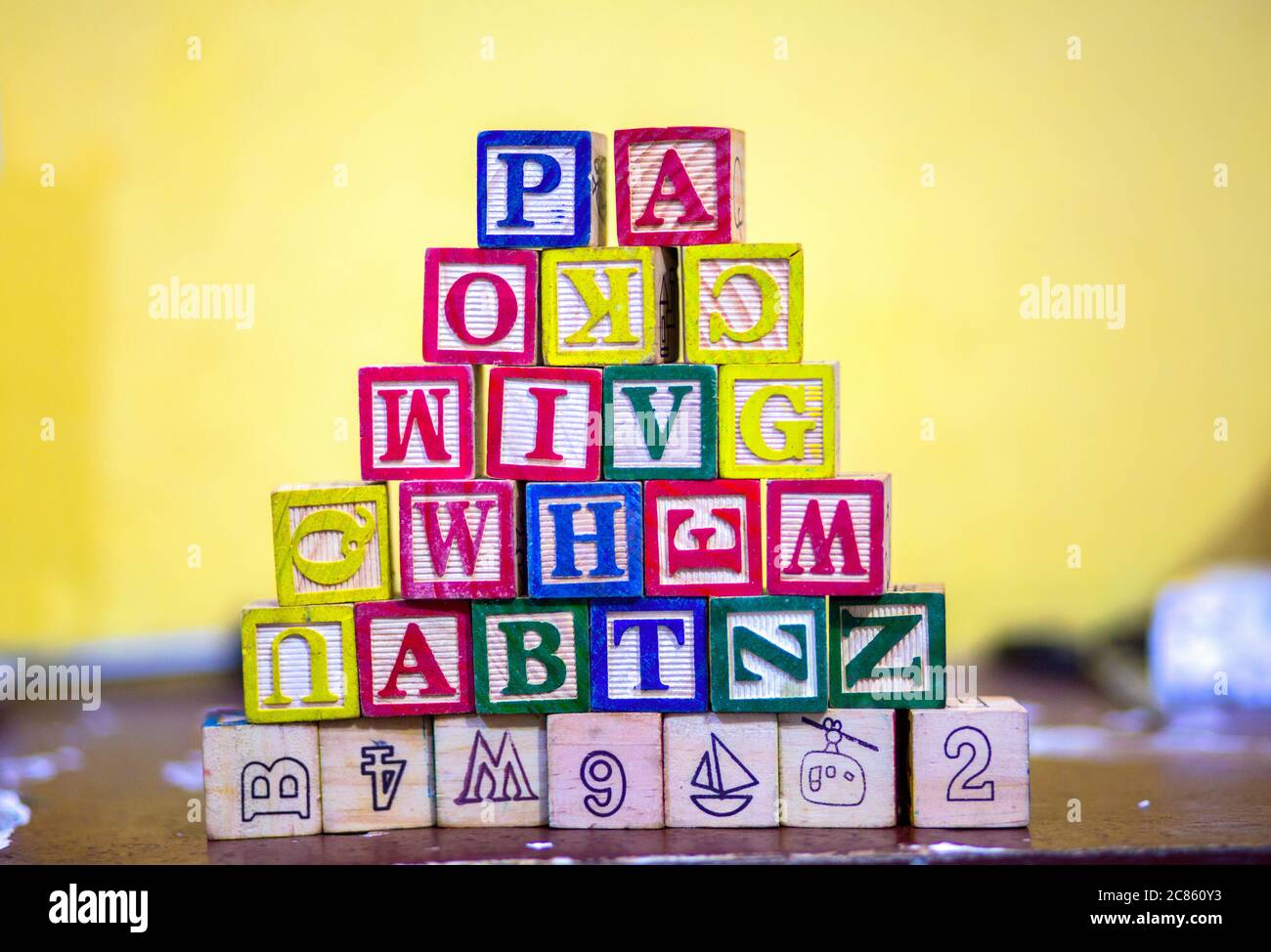 Kids learning alphabetic blocks hi-res stock photography and images - Alamy