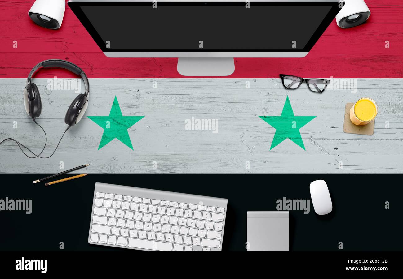 Syria flag background with headphone,computer keyboard and mouse on ...