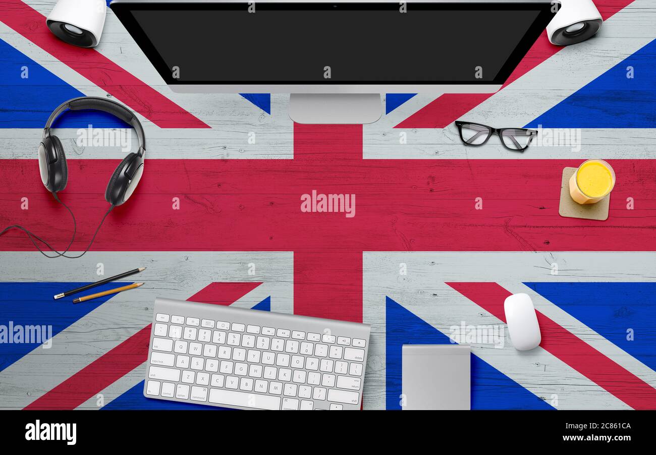 United Kingdom flag background with headphone,computer keyboard and ...