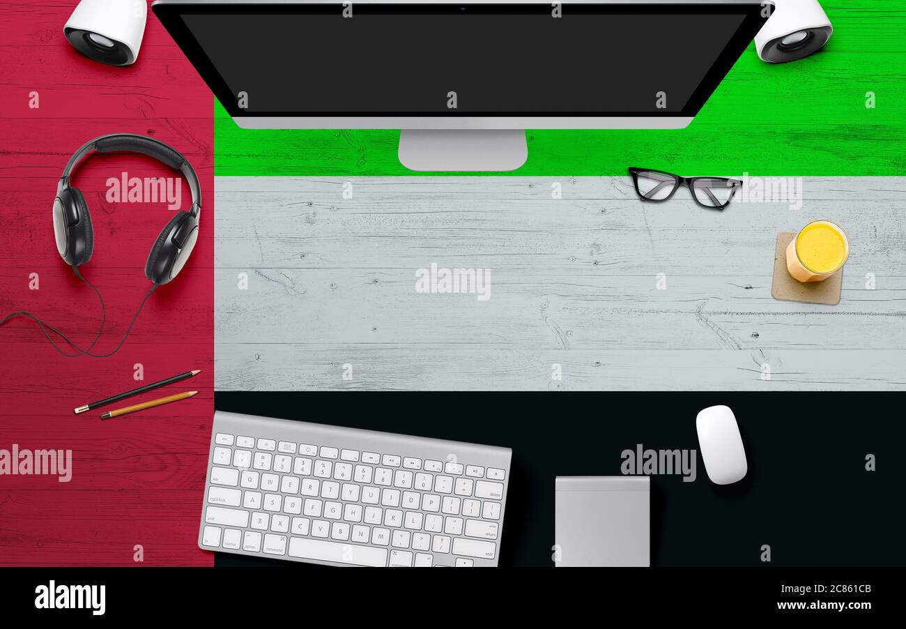 United Arab Emirates flag background with headphone,computer keyboard ...