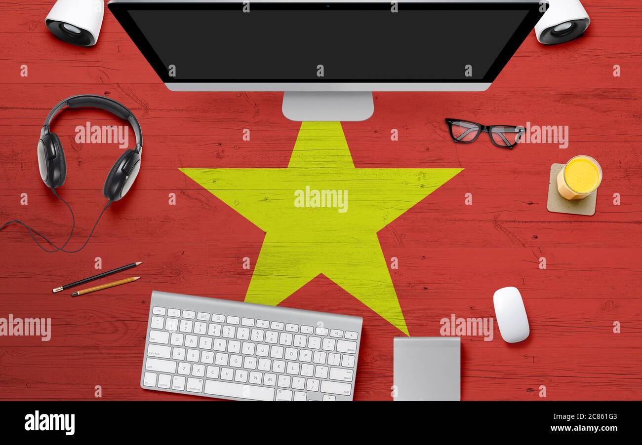 Vietnam flag background with headphone,computer keyboard and mouse on ...
