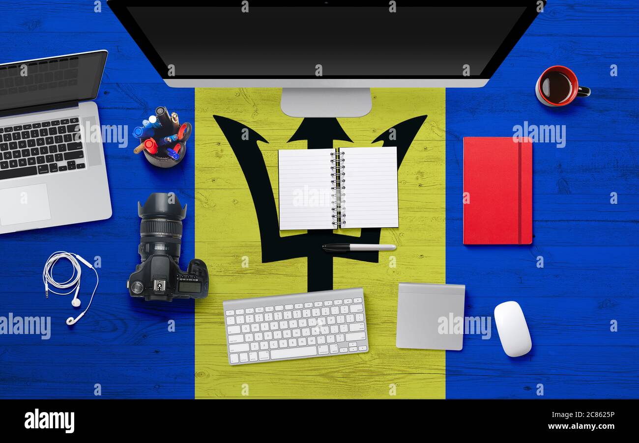Barbados flag background with headphone,camera, notebook and mouse on ...