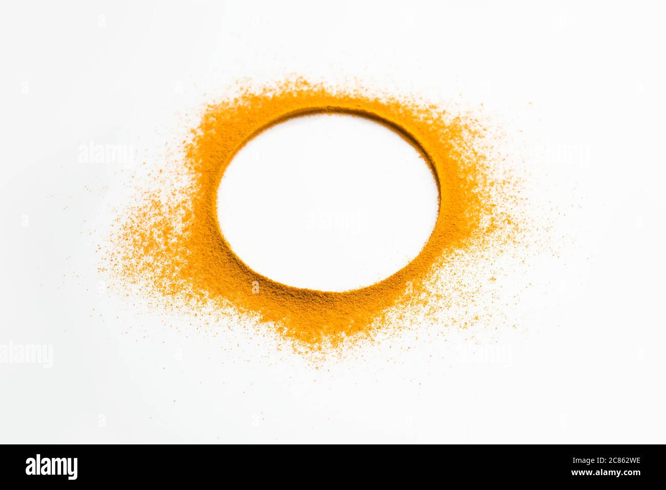 Haldi or Turmeric Powder Ring on the white background, selective focus ...