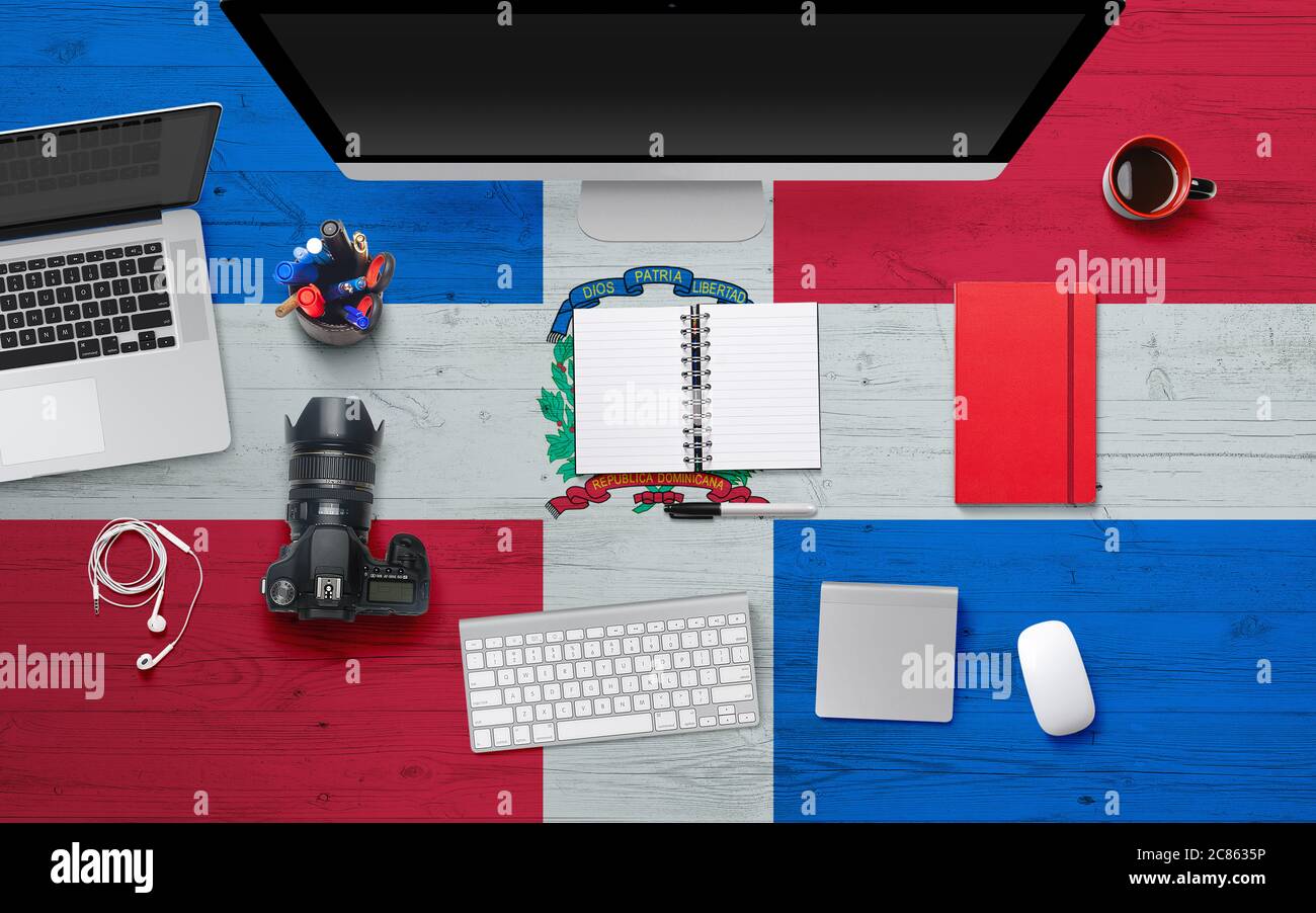 Dominican Republic flag background with headphone,camera, notebook and ...