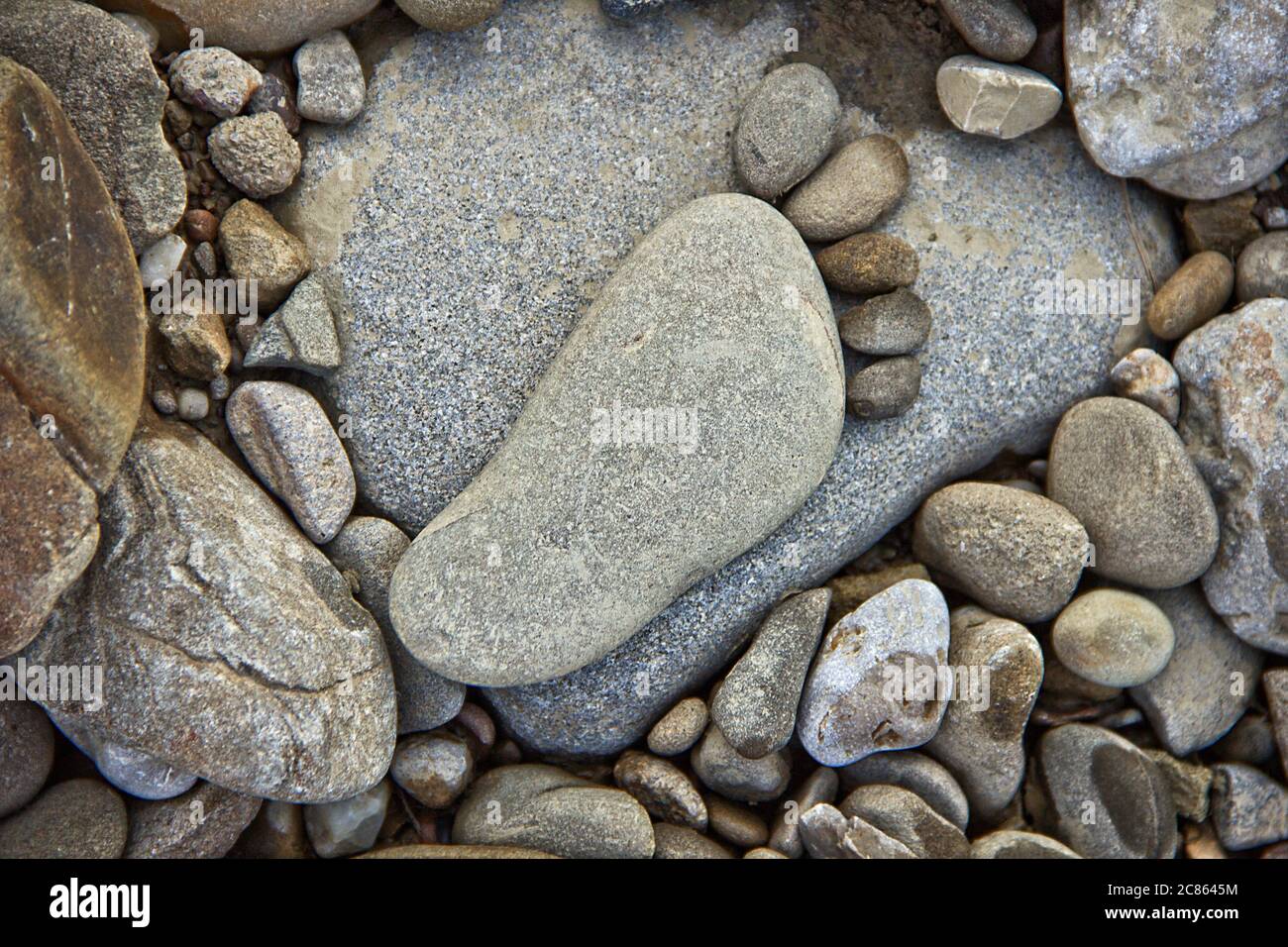 Imprint of a human foot from stones Stock Photo - Alamy