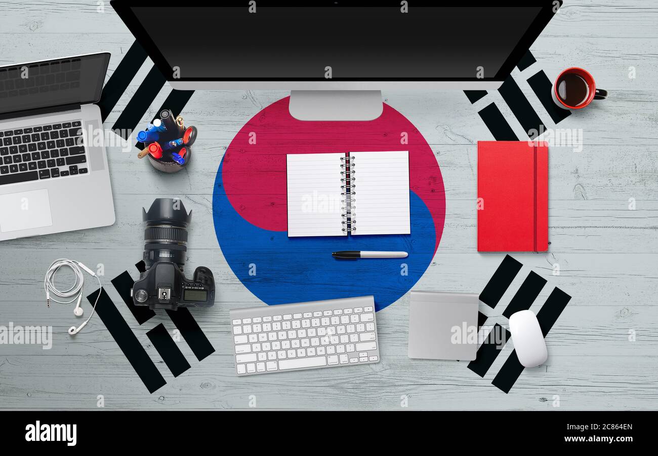 South Korea flag background with headphone,camera, notebook and mouse ...