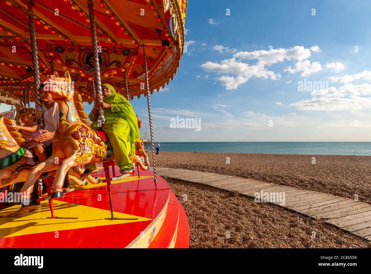 Brighton, September 7th 2006: People on the merry-go-round on Brighton ...