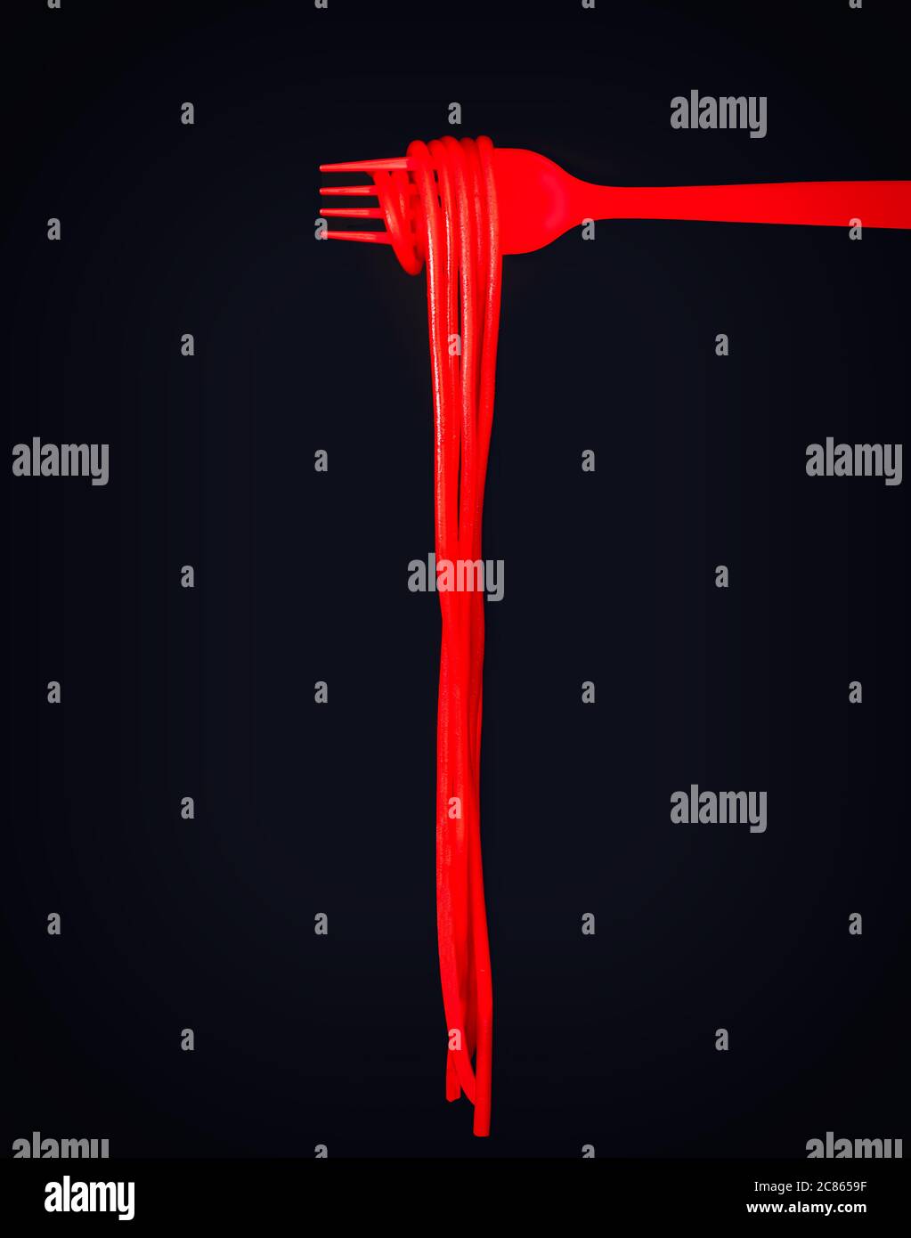 Magic food. Red spaghetti on a red fork, black backgroud and copy space ...