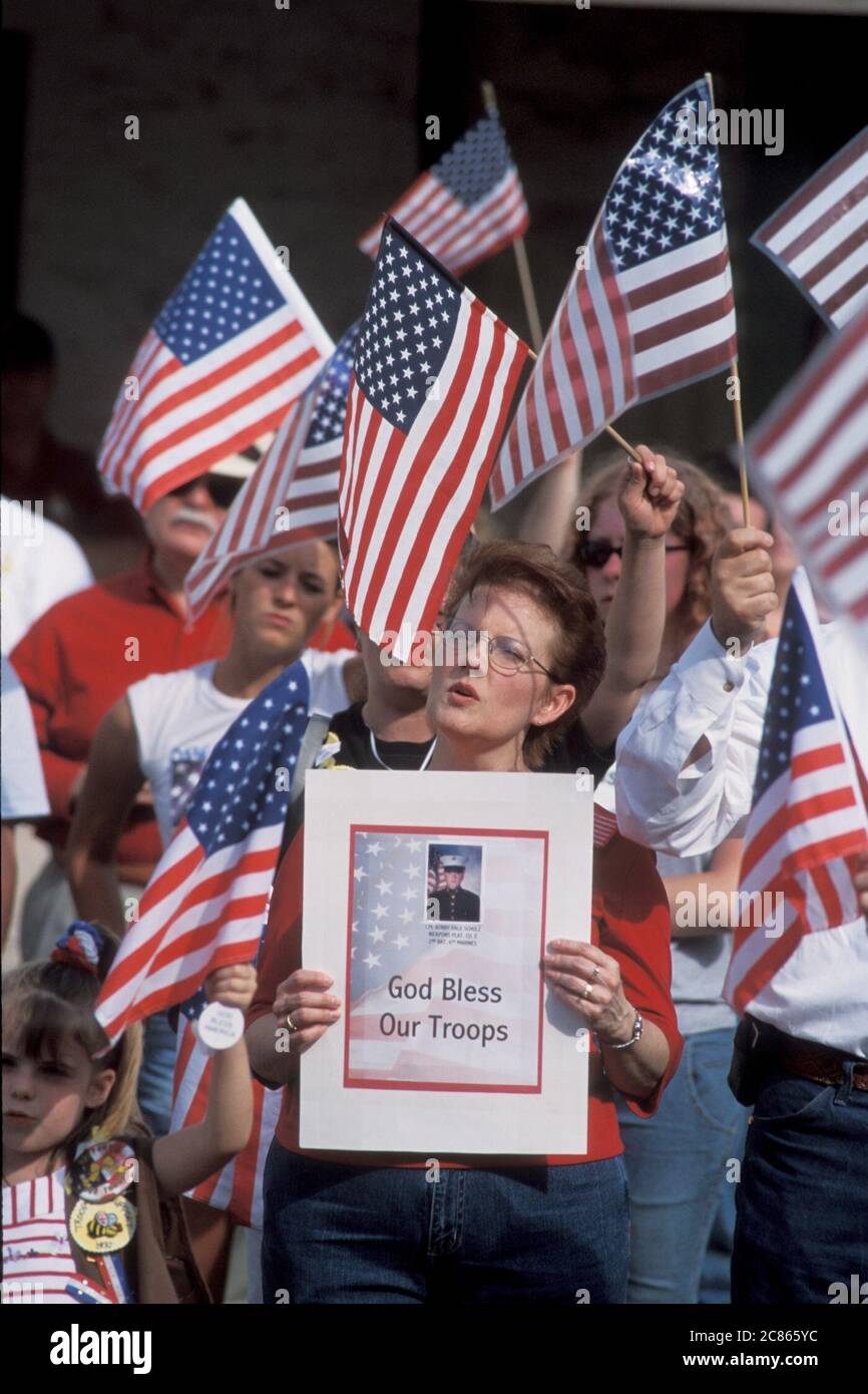 Georgetown, Texas USA, April 2003: American-flag-waving crowd attends ...