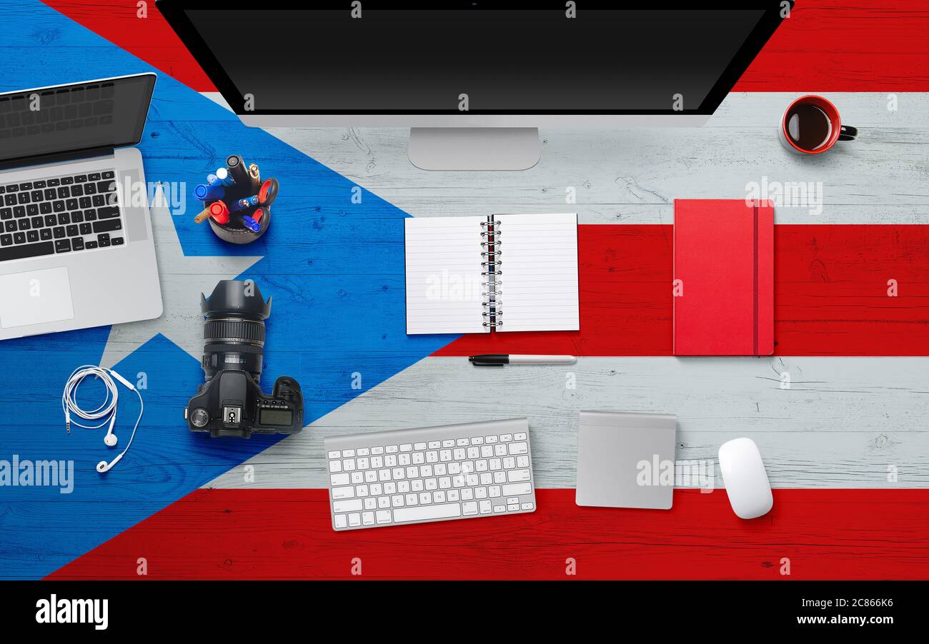 Puerto Rico flag background with headphone,camera, notebook and mouse ...