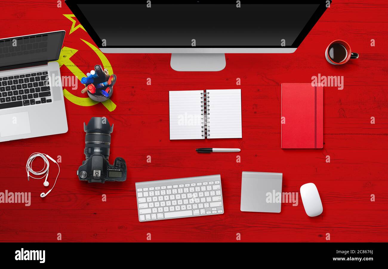 Soviet Union flag background with headphone,camera, notebook and mouse ...