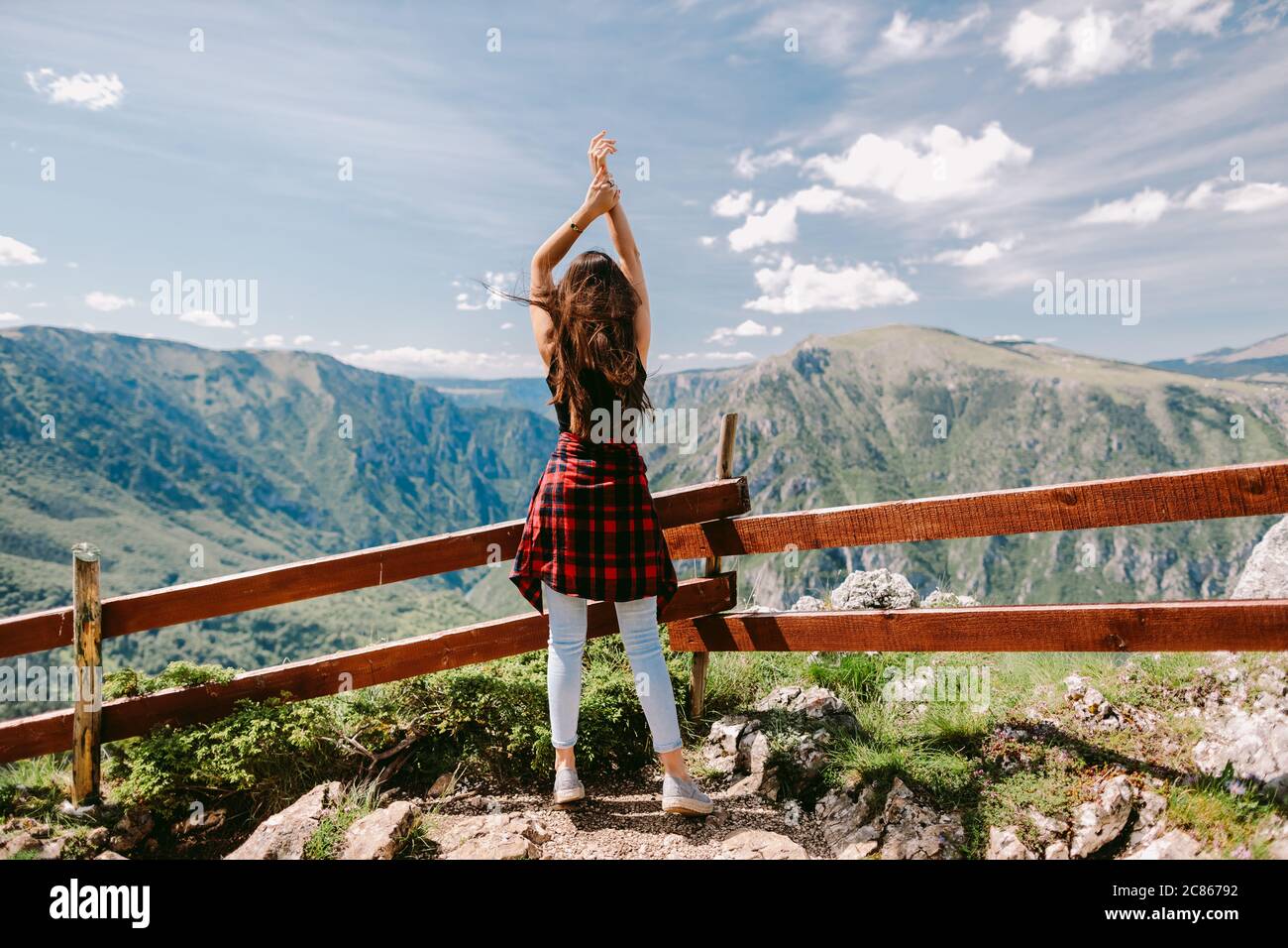 pretty woman relax in mountains with wind in hair Stock Photo - Alamy