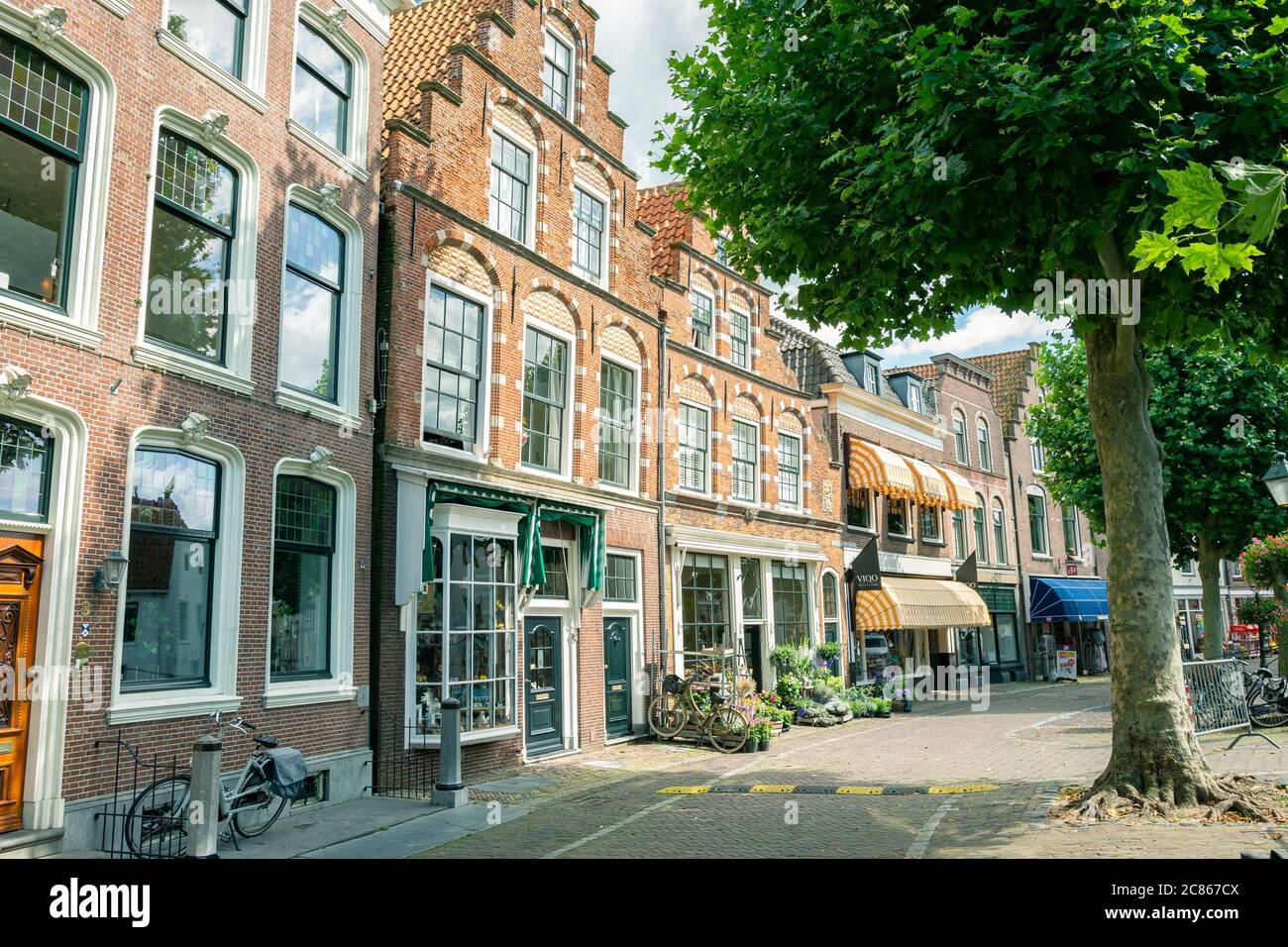 Old shopping street in the historic town of Oudewater, Holland Stock ...