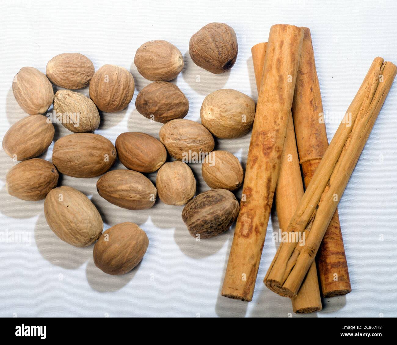 Ceylon Spices Cinnamon and Nutmeg in white background Stock Photo - Alamy
