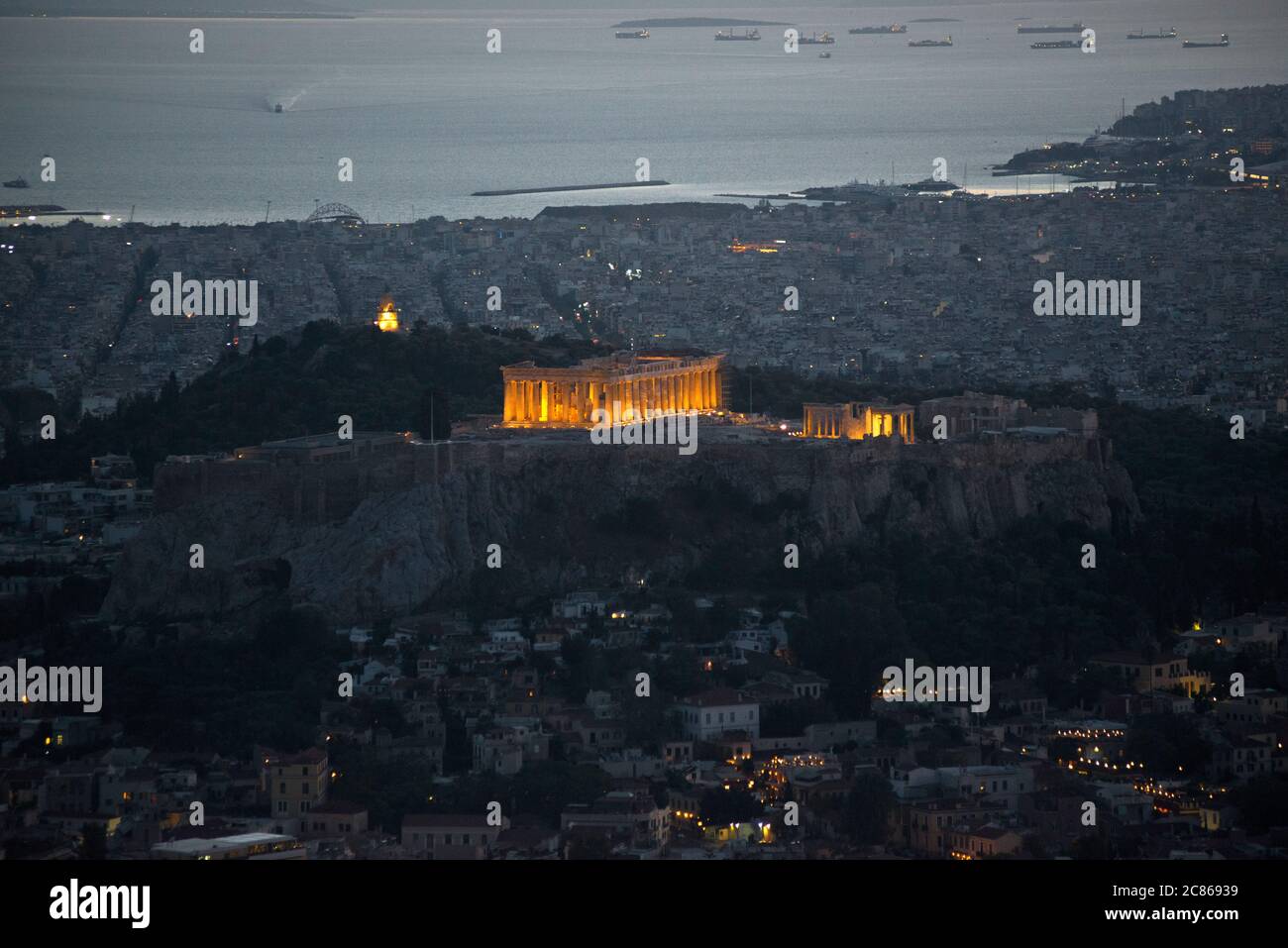 Sunset in Athens, view from Lycabettus Mountain with the Acropolis and the Parthenon at twilight ...
