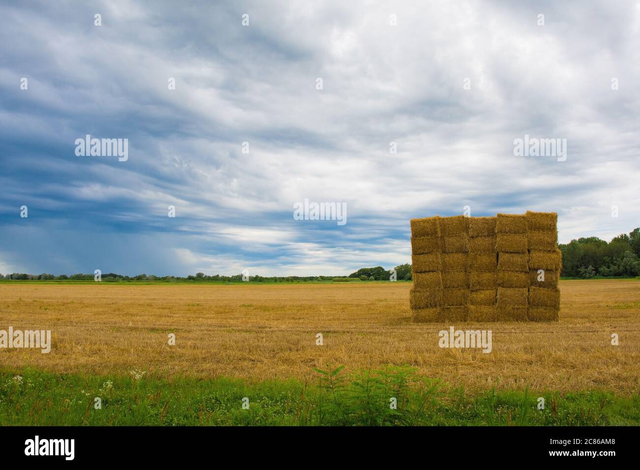 Square haystacks in a square arrangement on the north east Italian ...