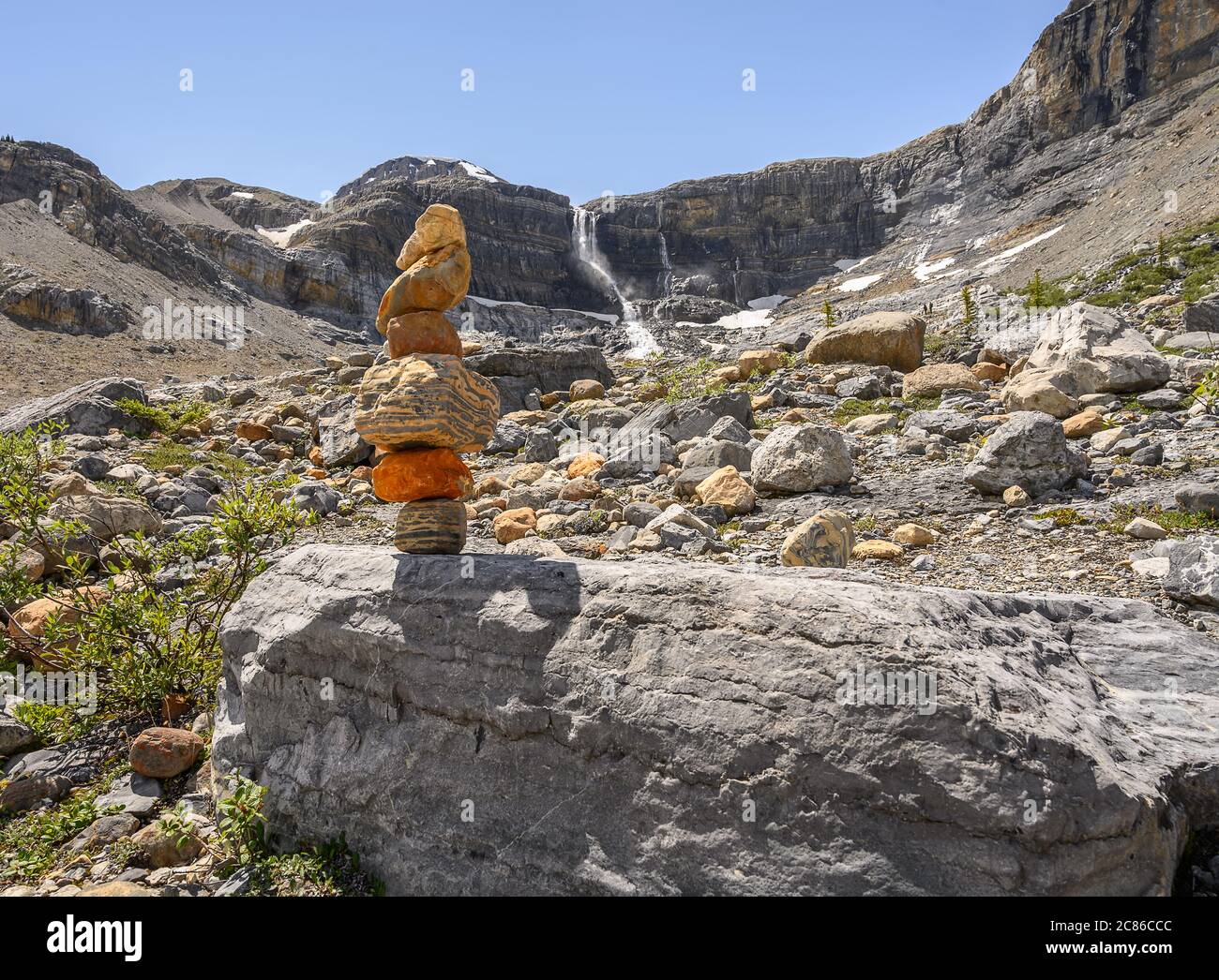 Inuksuk (Inukshuk) at Bow Falls in Banff National Park, Alberta, Canada ...