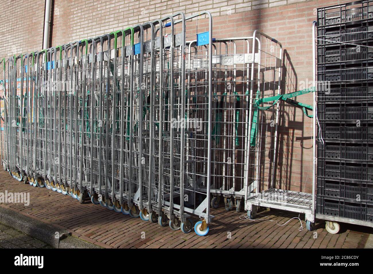 Roll containers or roll cage trolleys with grey stackable plastic ...