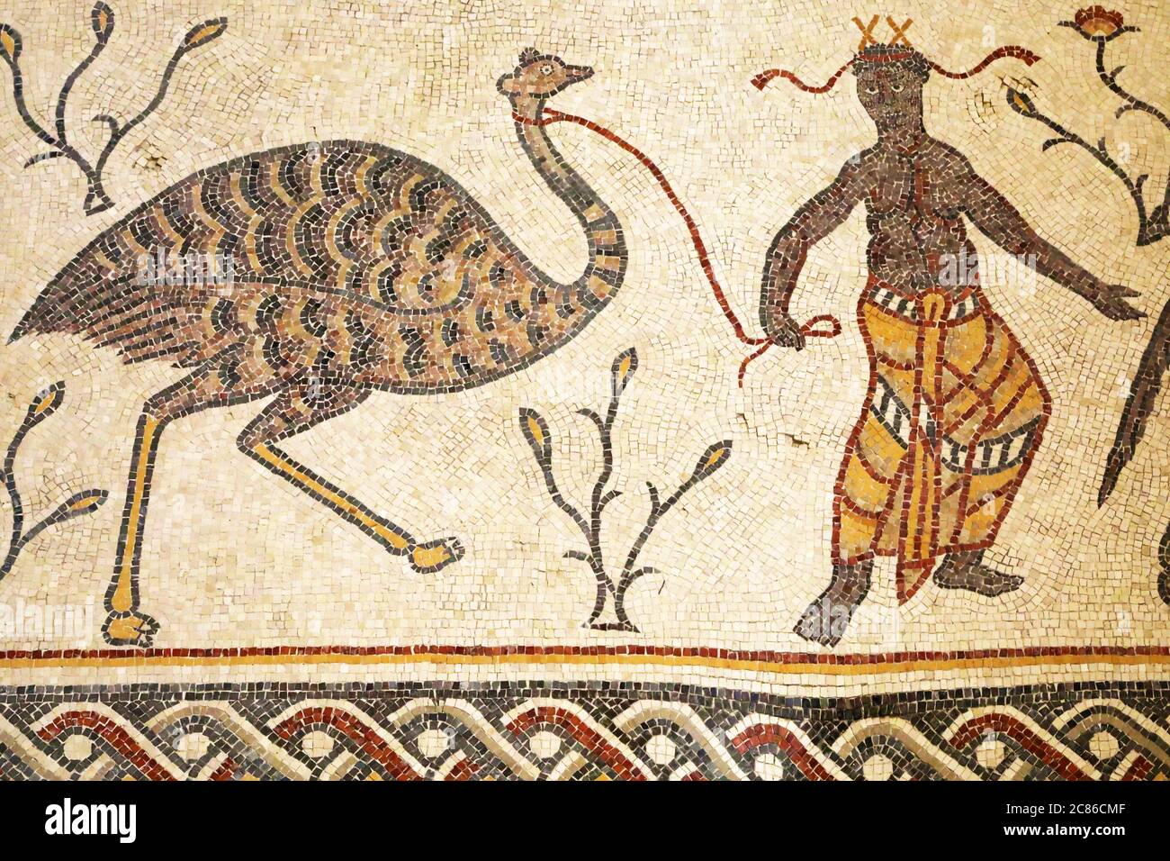 Man with ostrich in ancient mosaics of Mount Nebo, Jordan Stock Photo ...