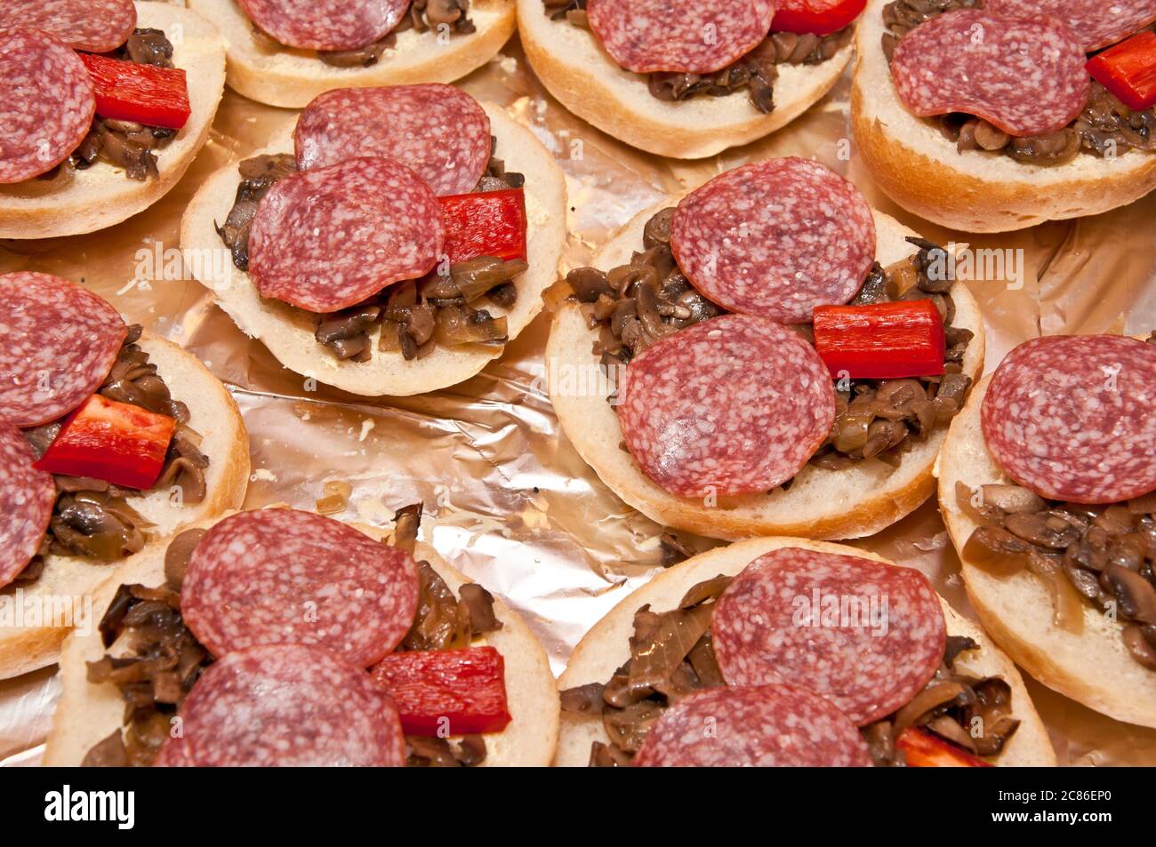 Mini pizza loaves Stock Photo - Alamy