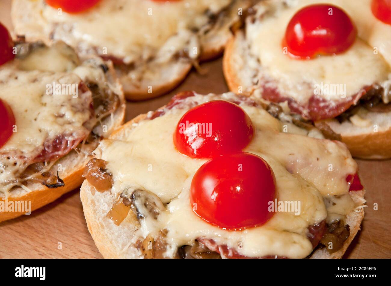 Mini pizza loaves Stock Photo - Alamy
