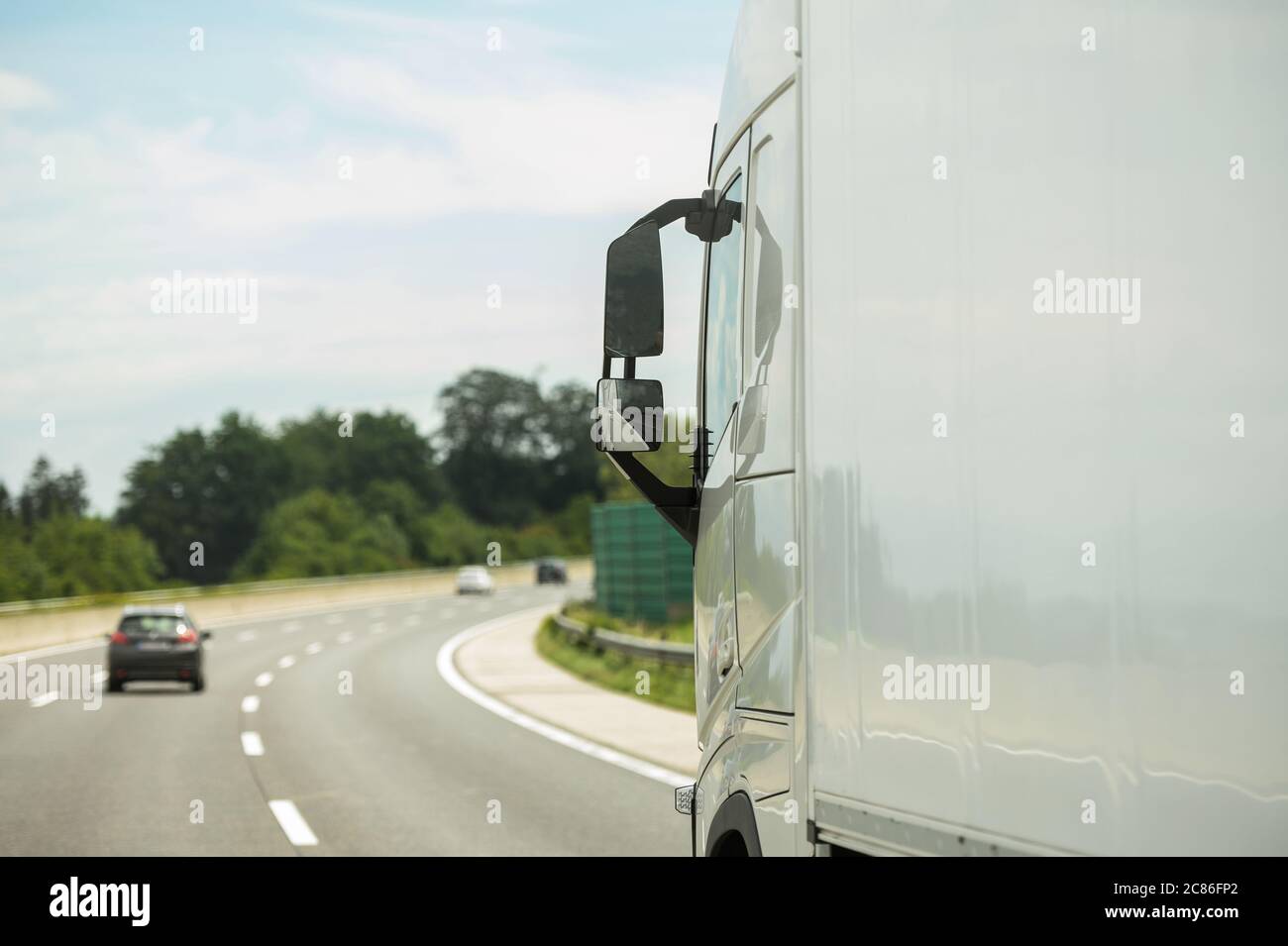 Modern Semi Truck on a Highway Right Before Strong Right Turn Curve ...