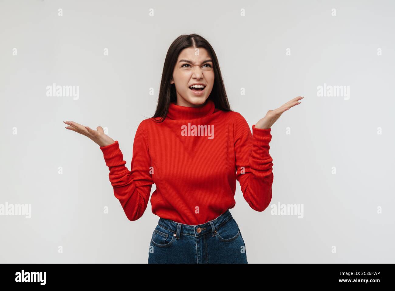 Photo of irritated beautiful woman looking upward with throwing up ...