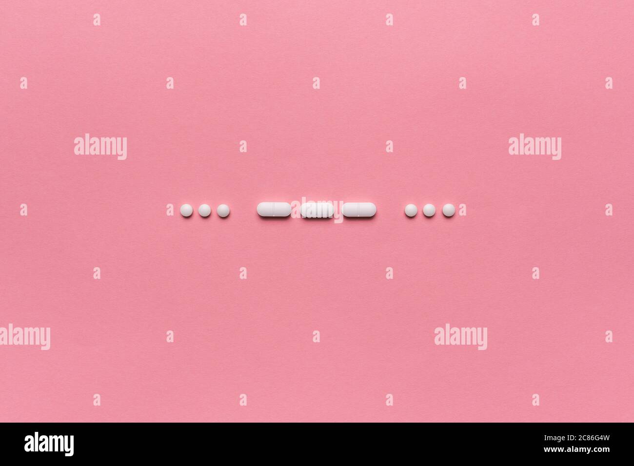 SOS morse code with medical drugs and pills, top view flat lay ...