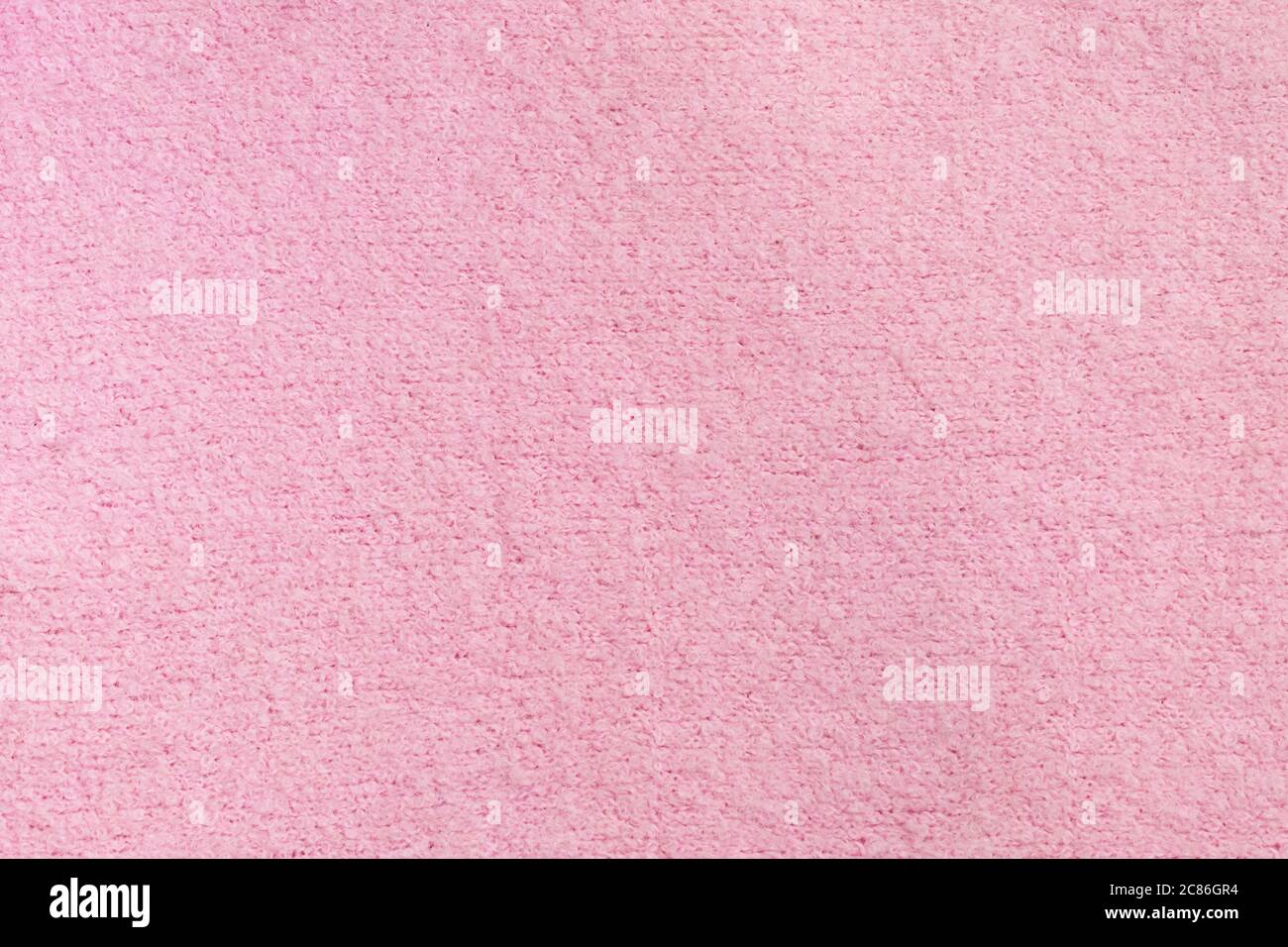 Pastel pink knitted woolen fabric texture background Stock Photo - Alamy