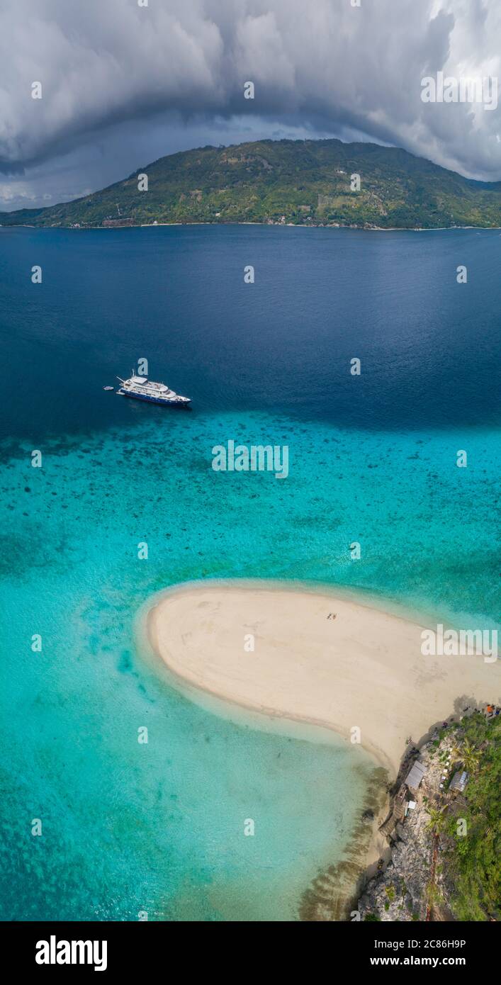 An aerial view of the sand bar off the corner of Sumion Island, a tiny ...