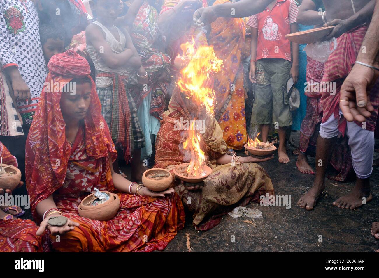 devotees performing dhuni ritual Stock Photo - Alamy