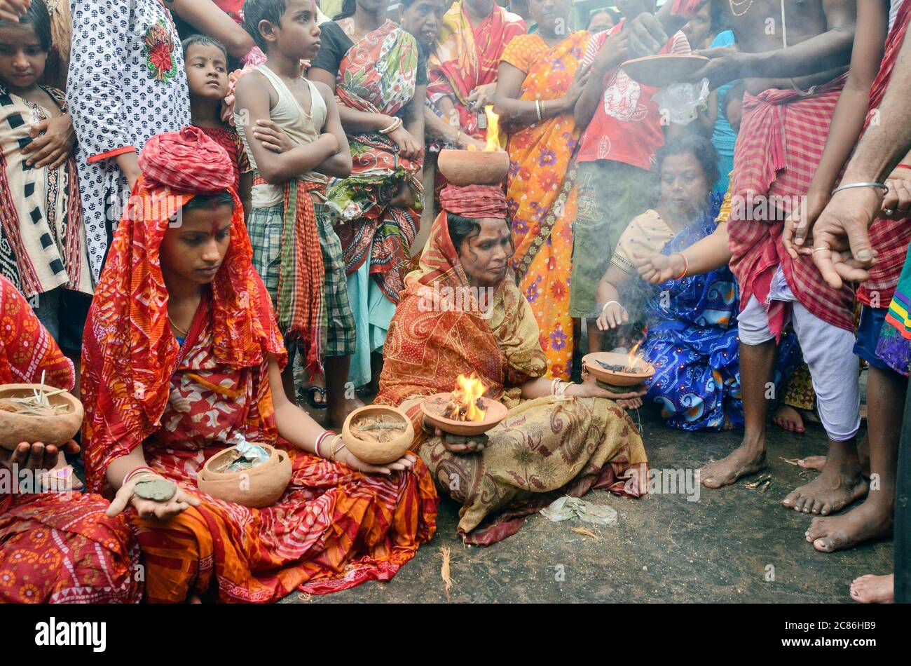 Woman performing puja on hi-res stock photography and images - Alamy